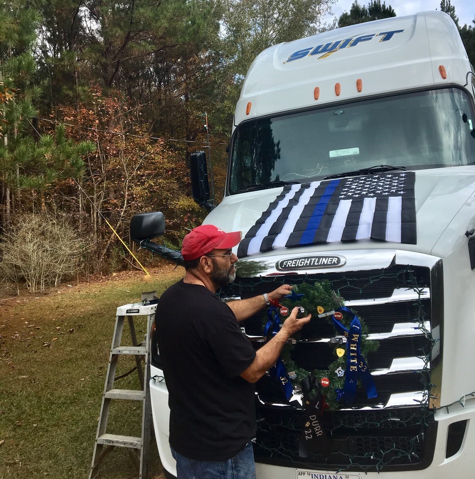 Trucker Don Copeland turns Christmas parade ‘blue’ to honor fallen law ...