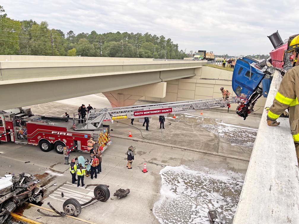 Driver rescued from big rig dangling over Texas bridge - TheTrucker.com