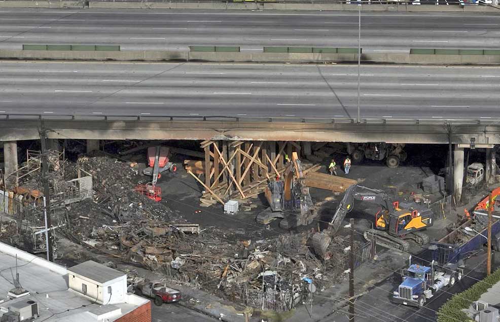 Fire that indefinitely closed vital Los Angeles freeway was likely ...