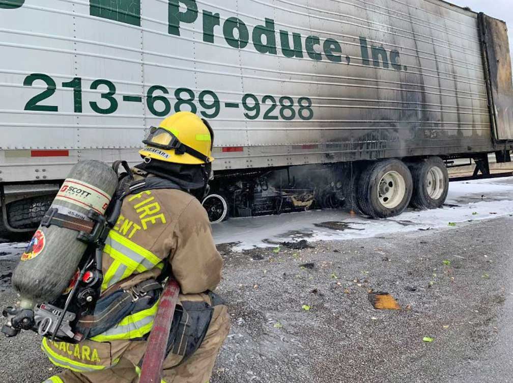 Passenger car destroyed after crashing under semi's trailer ...