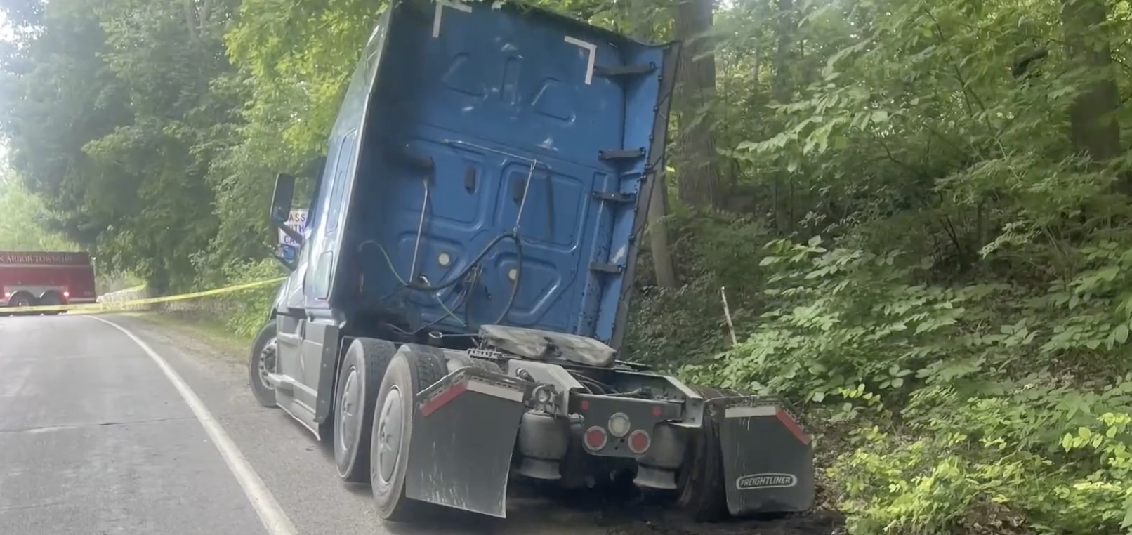Burned body found during semi crash investigation in Michigan ...